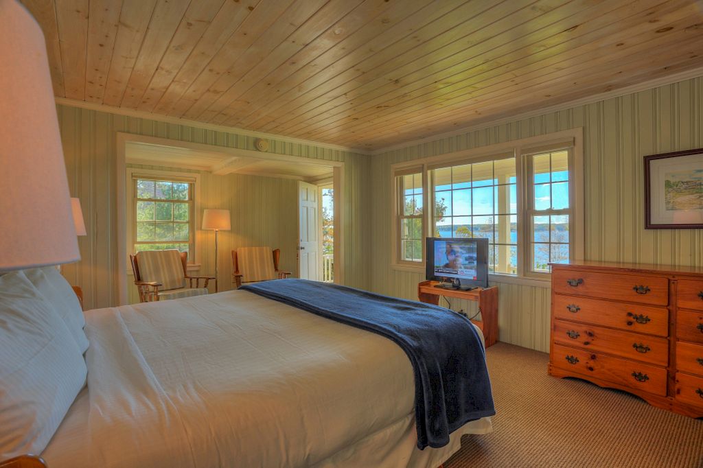 Coastal Charm: Cottage Rooms at Spruce Point Inn, Your Serene Getaway
