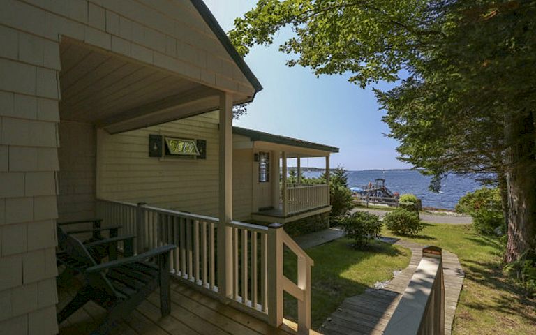 Coastal Charm: Cottage Rooms at Spruce Point Inn, Your Serene Getaway