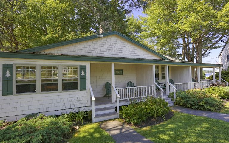 Coastal Charm: Cottage Rooms at Spruce Point Inn, Your Serene Getaway